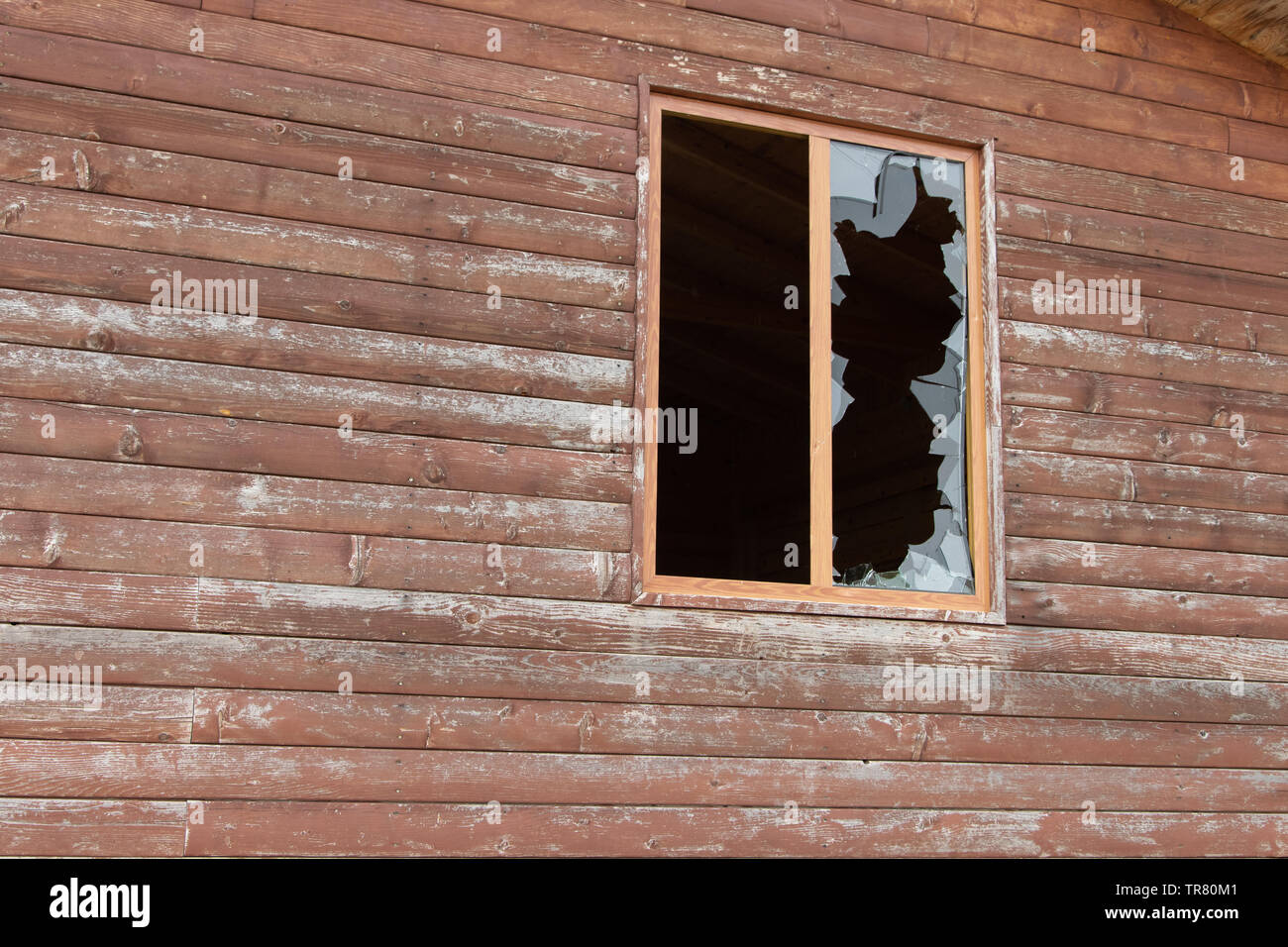 Cracked and broken glass window. Vandalism fracture Stock Photo - Alamy