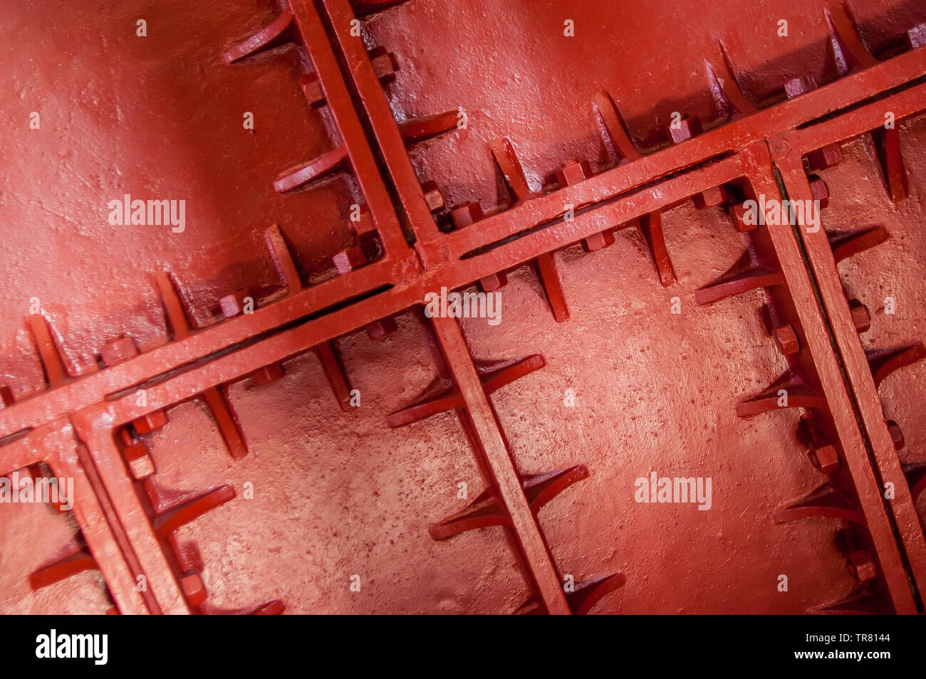 The inside of a red cast iron lighthouse Stock Photo - Alamy