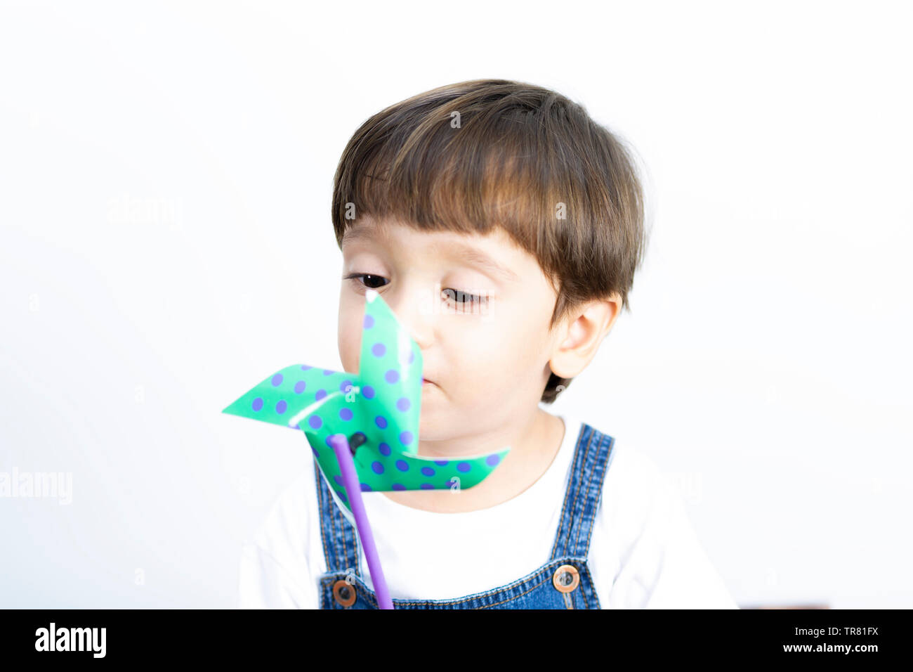 Little Happy Boy Playing with Pinwheel, Wind Play Stock Photo - Alamy