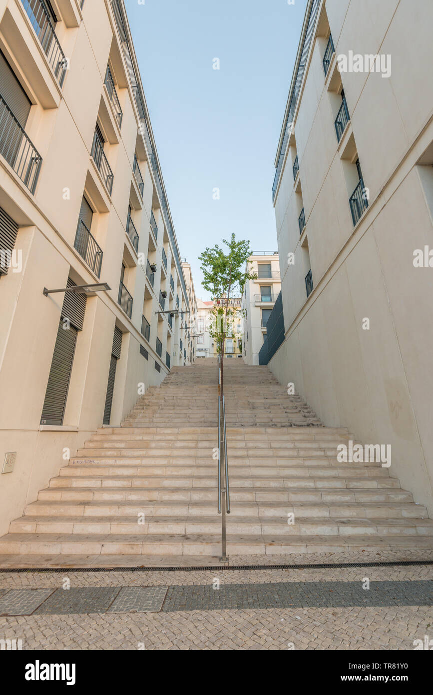 Concrete stairs between houses Stock Photo - Alamy