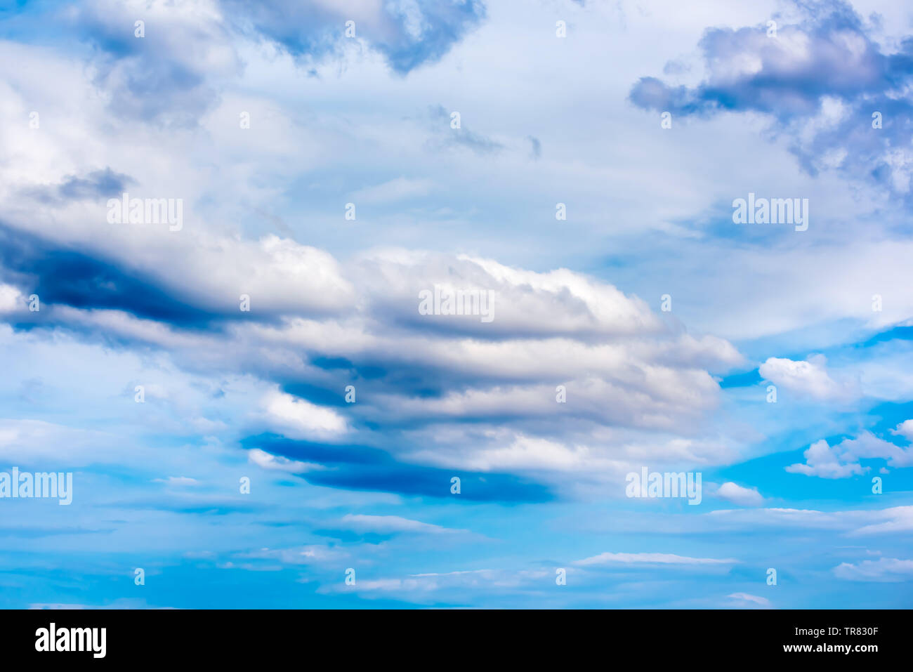 Colourful and creative clouds composition on sunset sky Stock Photo - Alamy