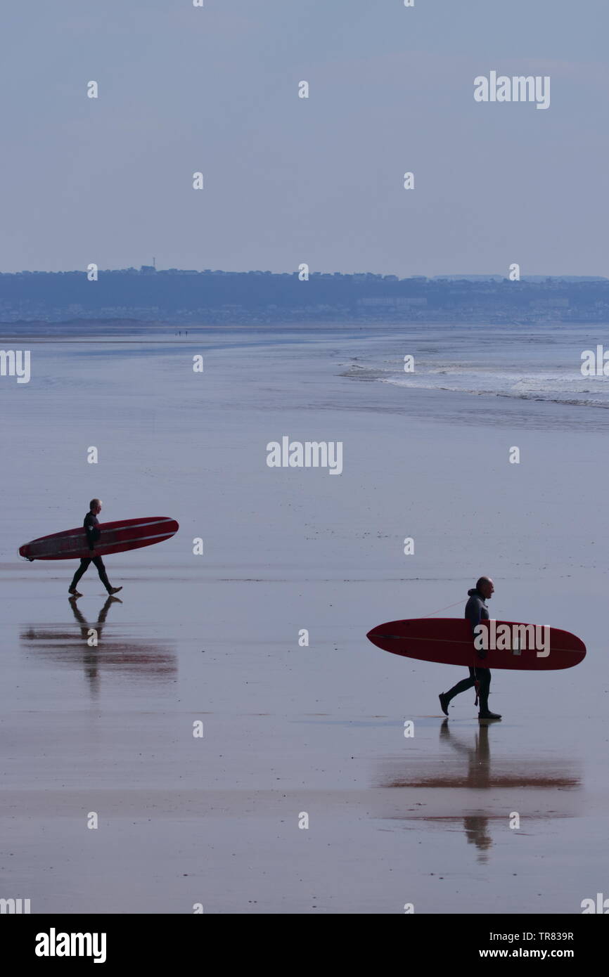 two surfers on the way to the sea Stock Photo - Alamy