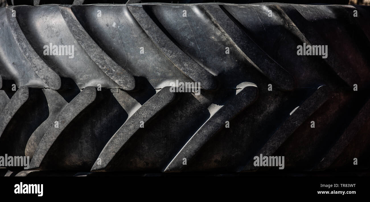 Tracks of a brand new tractor tyre Stock Photo - Alamy