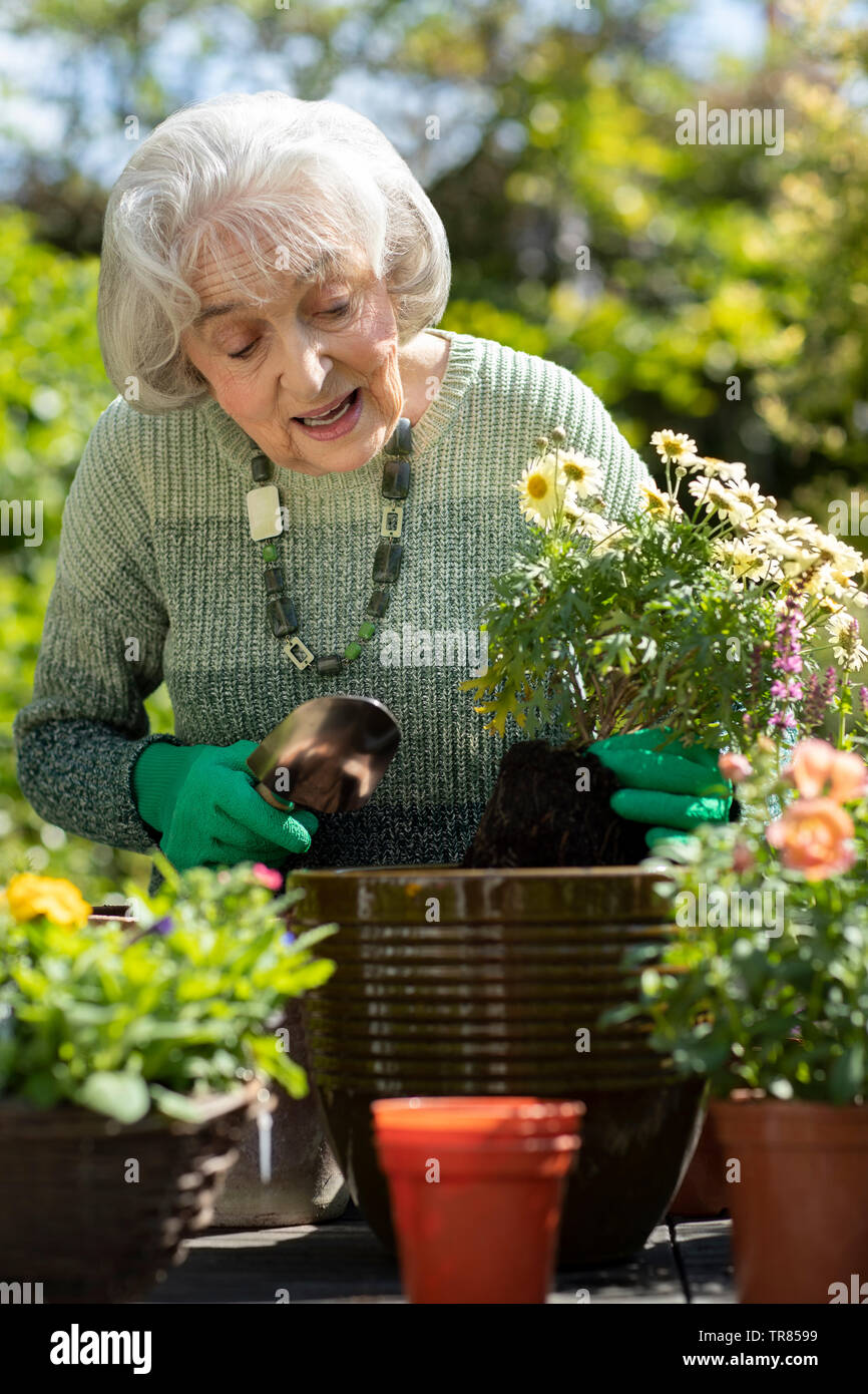 Planting senior hi-res stock photography and images - Alamy