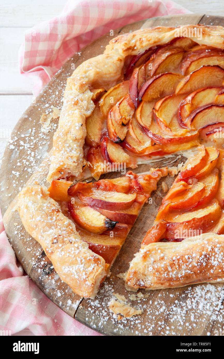 Homemade peach pie made with flakey puff pastry Stock Photo - Alamy