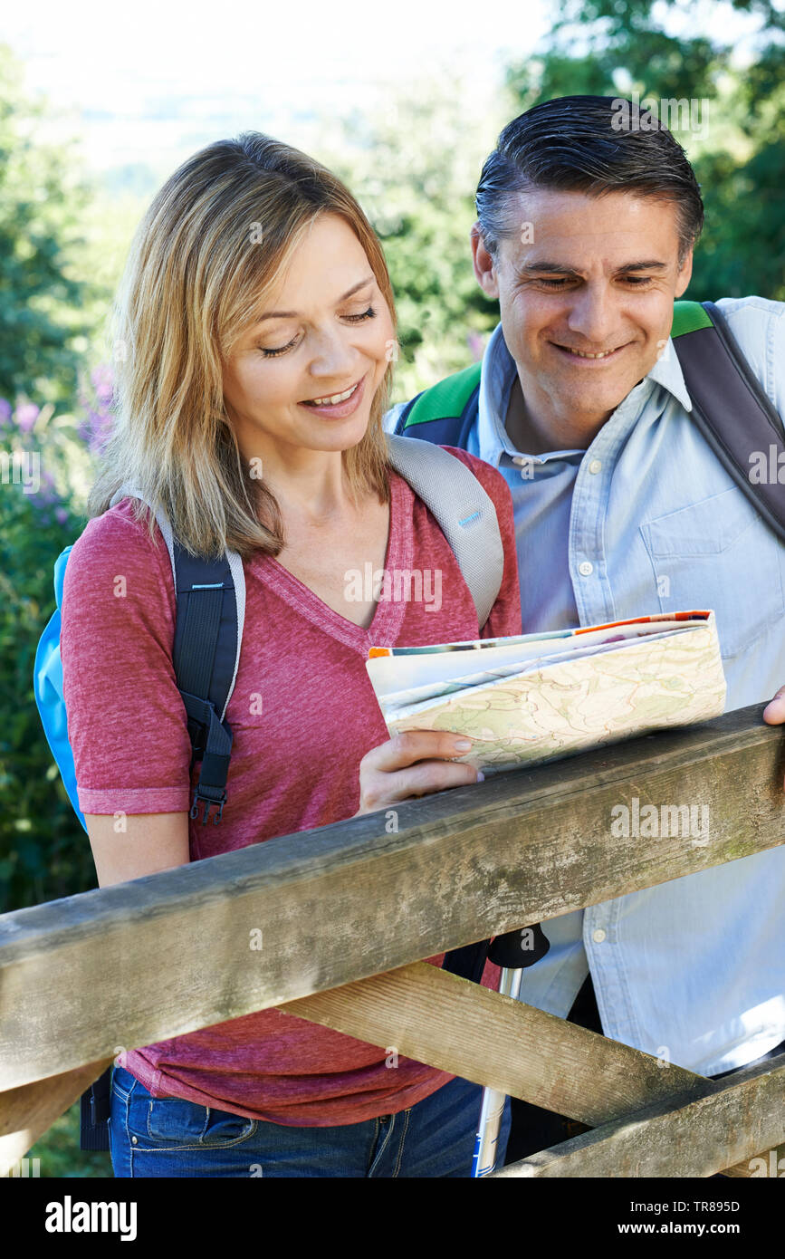 Happy middle aged couple map in hi-res stock photography and images - Alamy