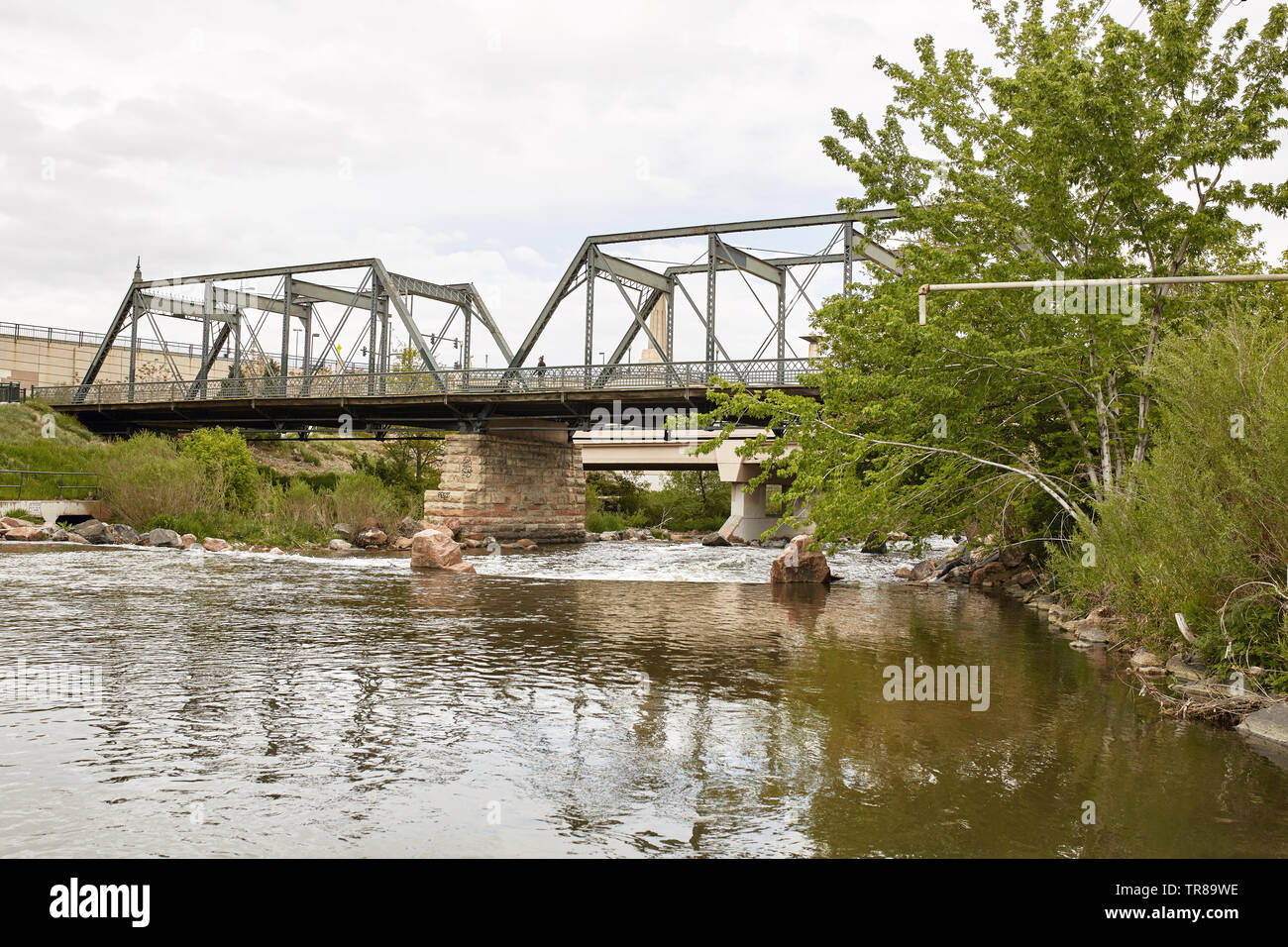 Bridge over Platte River in Confluence Park, part of the Riverfront ...