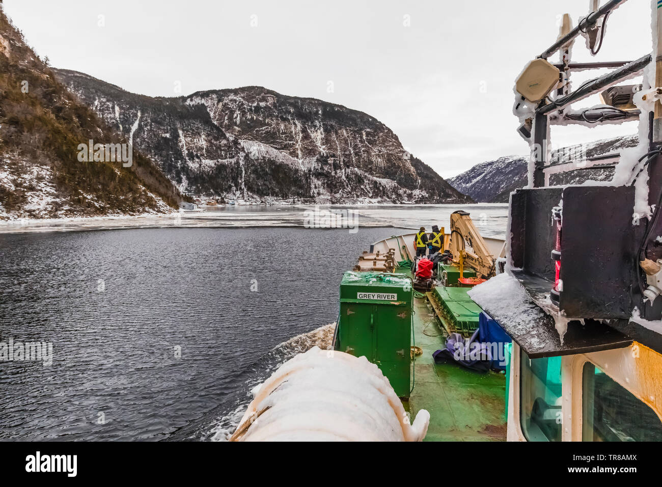 Ferry Marine Voyager in a fjord approaching the outport of Grey River ...