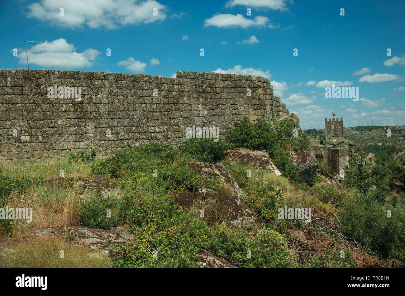 Wall made of stone bricks around historic city center on a rocky ...