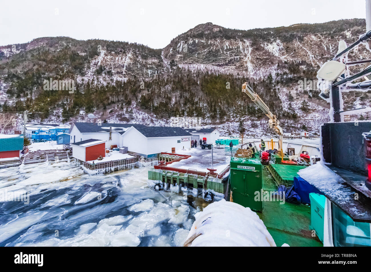 Waterfront with floating pancake ice at the outport of Grey River ...