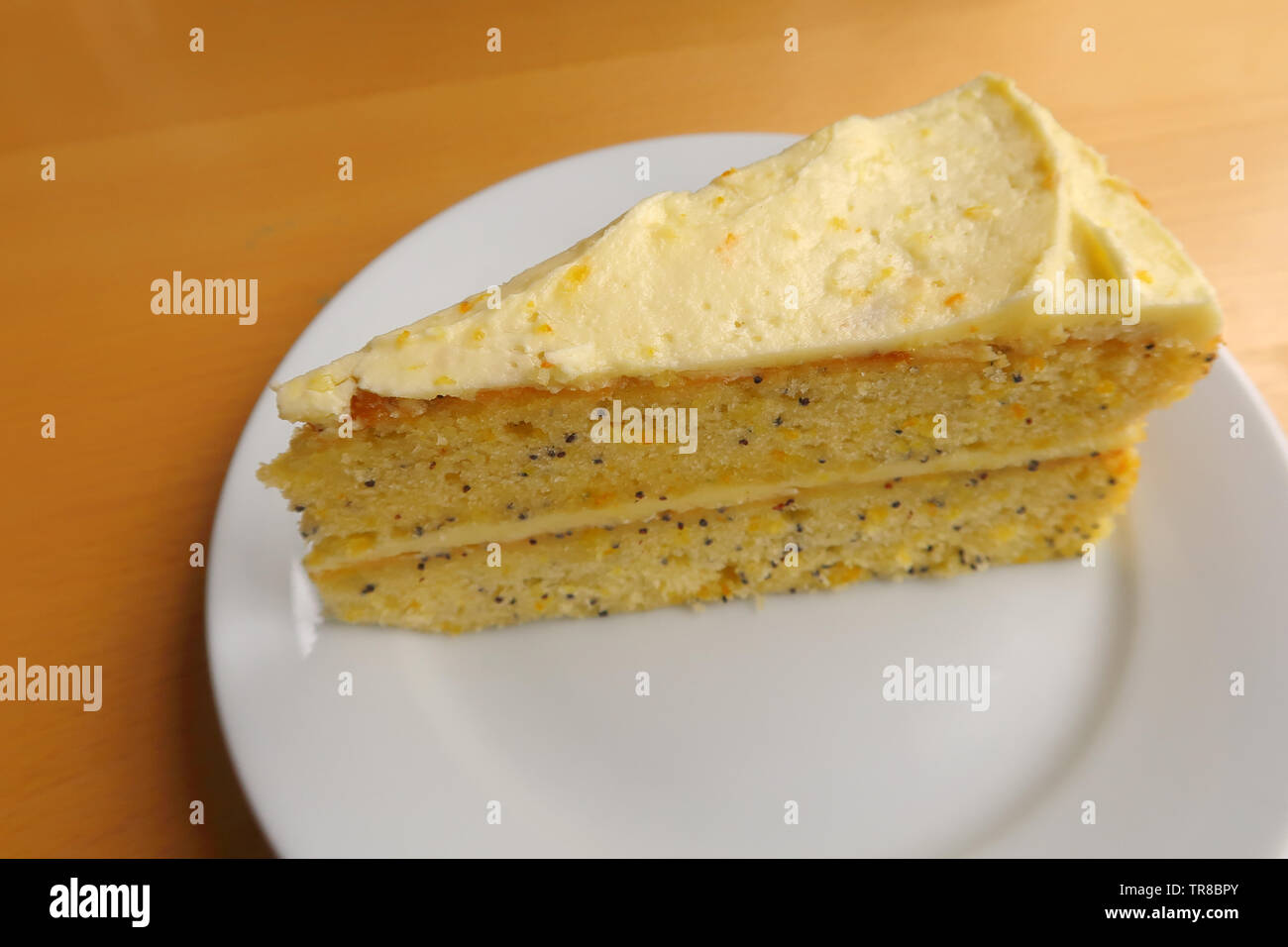 A slice of Lemon Cake Stock Photo - Alamy