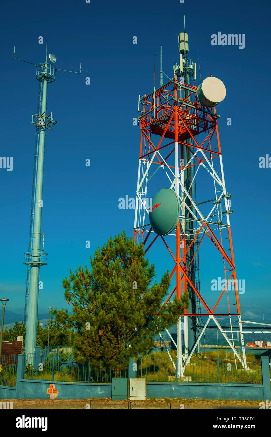 Telecommunication towers with antennas on a base transceiver station at ...