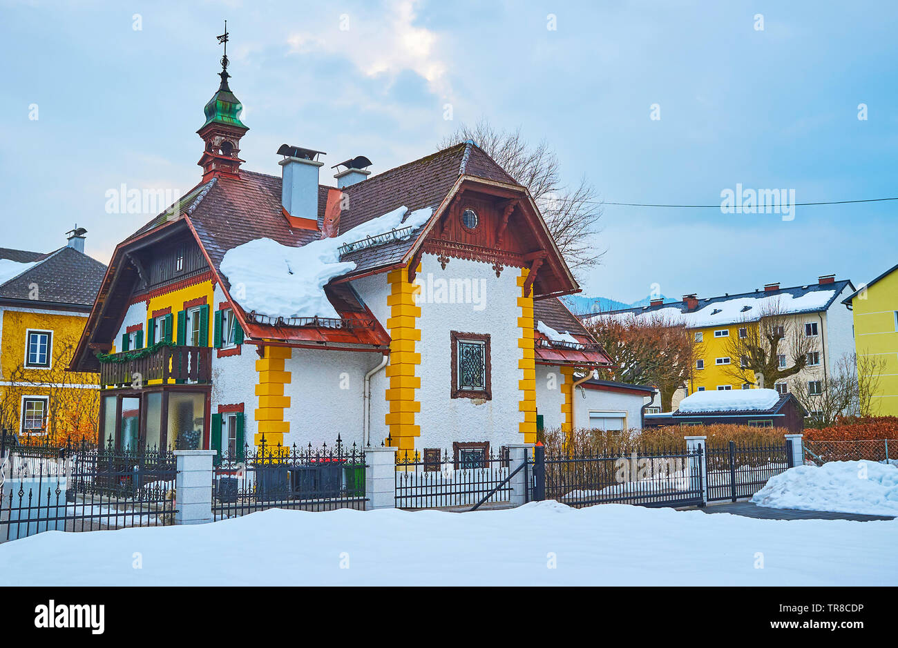 The old villa, decorated with bright painted details, carved wooden ...