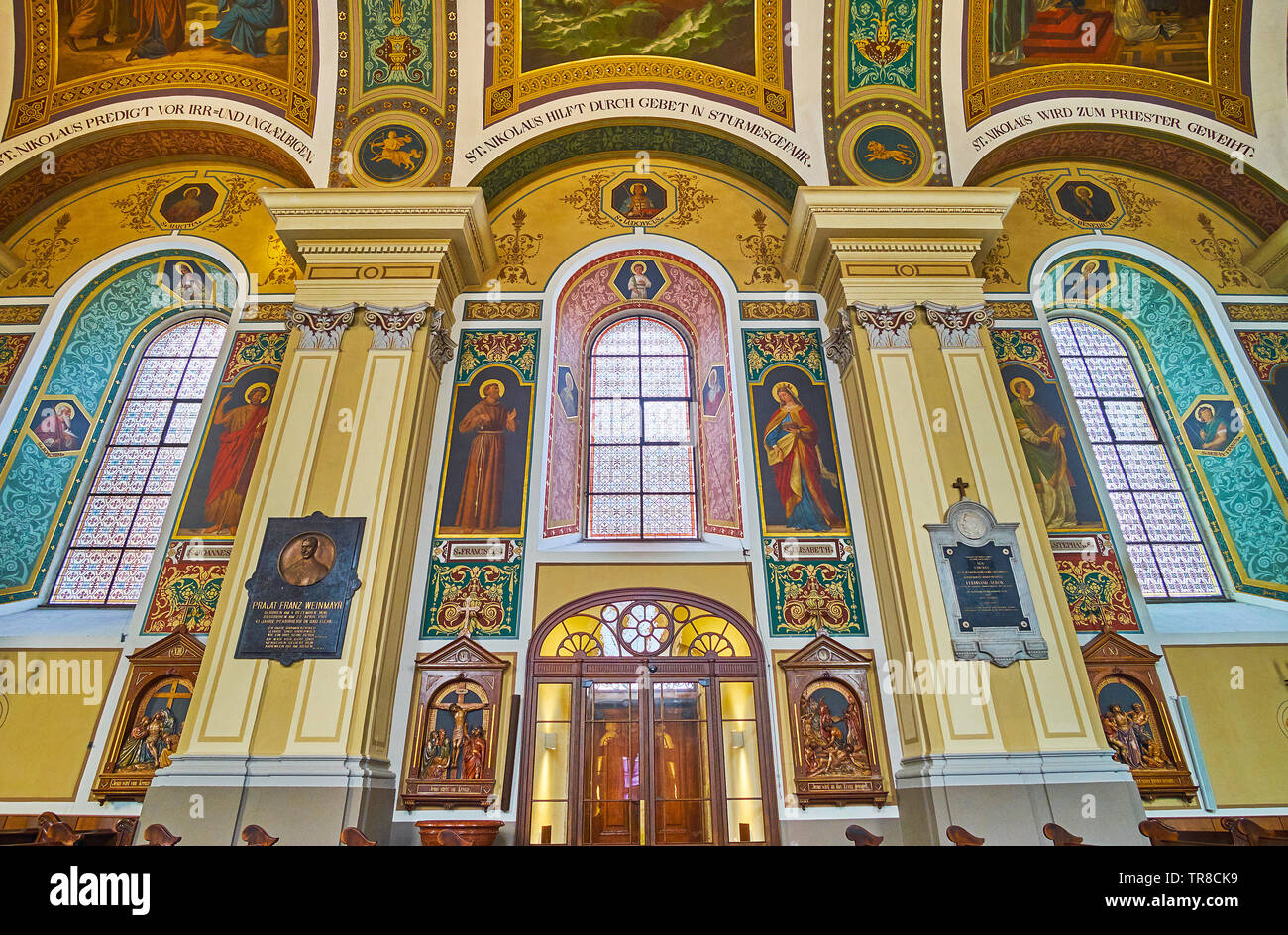 BAD ISCHL, AUSTRIA - FEBRUARY 20, 2019: The wall of St Nicholas Parish ...