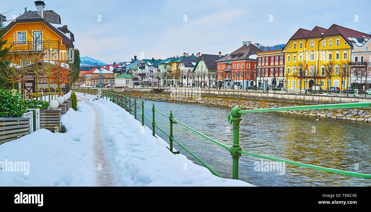 The snowy riverside cityscape of Bad Ischl - the famous spa resort of ...