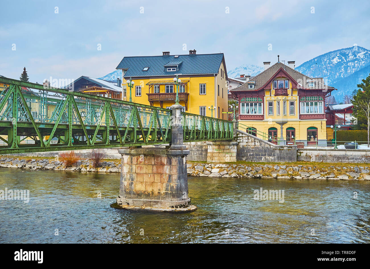 The Taubersteg pedestrian bridge connects the banks of Traun river with ...