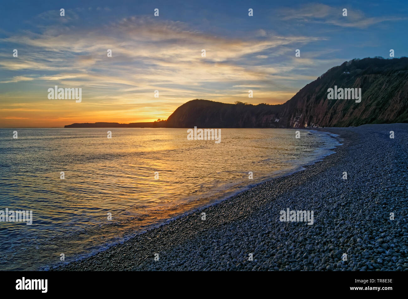 UK,Devon,Sidmouth,Sunset looking West from Jacobs Ladder Beach Stock ...