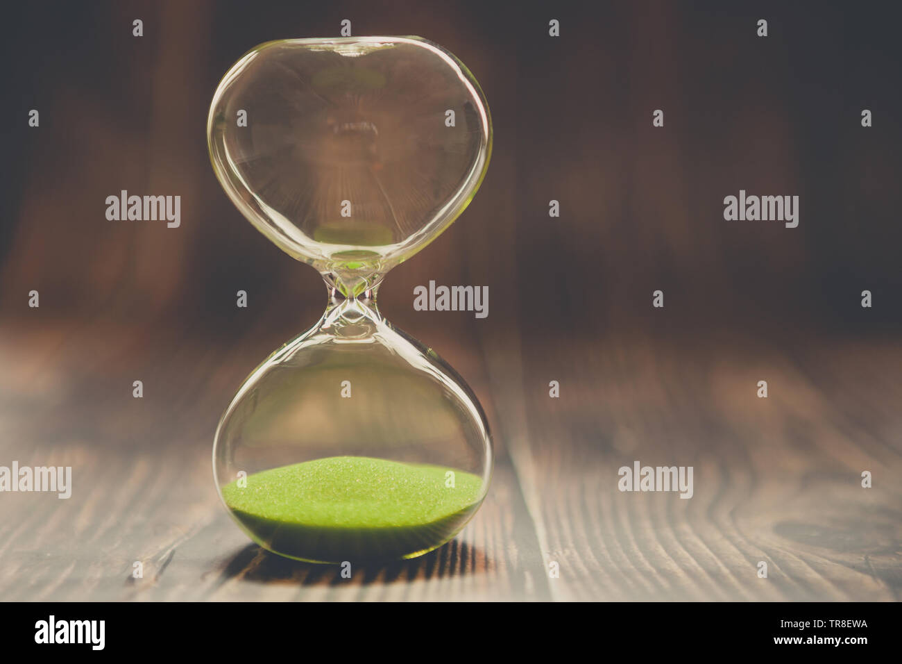 Hourglass as a concept of past time, lost time or completed cases ...