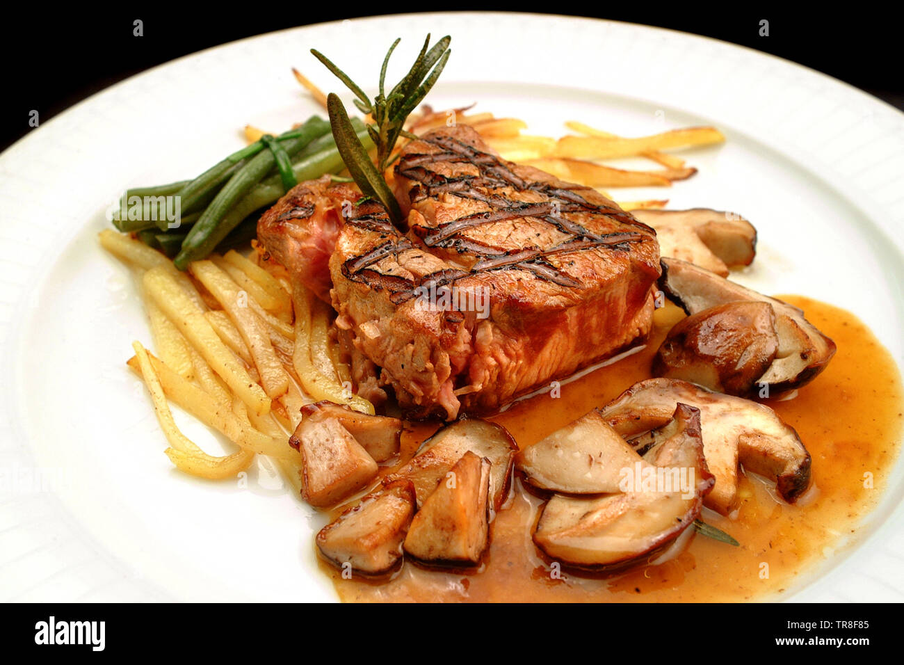 Italian food recipes grilled veal fillet with mushrooms Stock Photo - Alamy