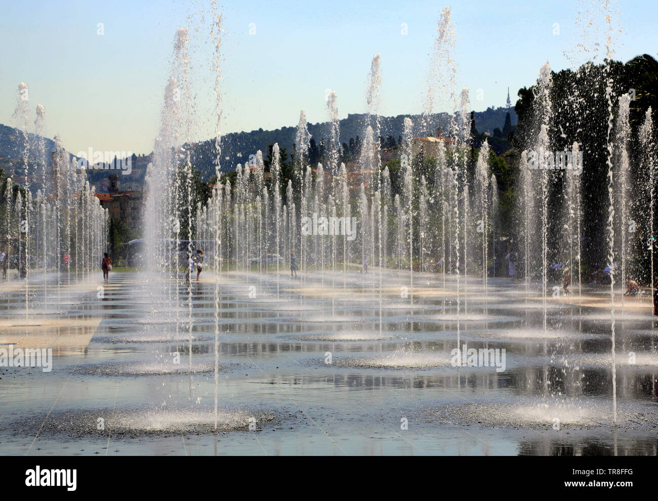 Promenade du Paillon in Nice, France, and its fountains on a summer day ...