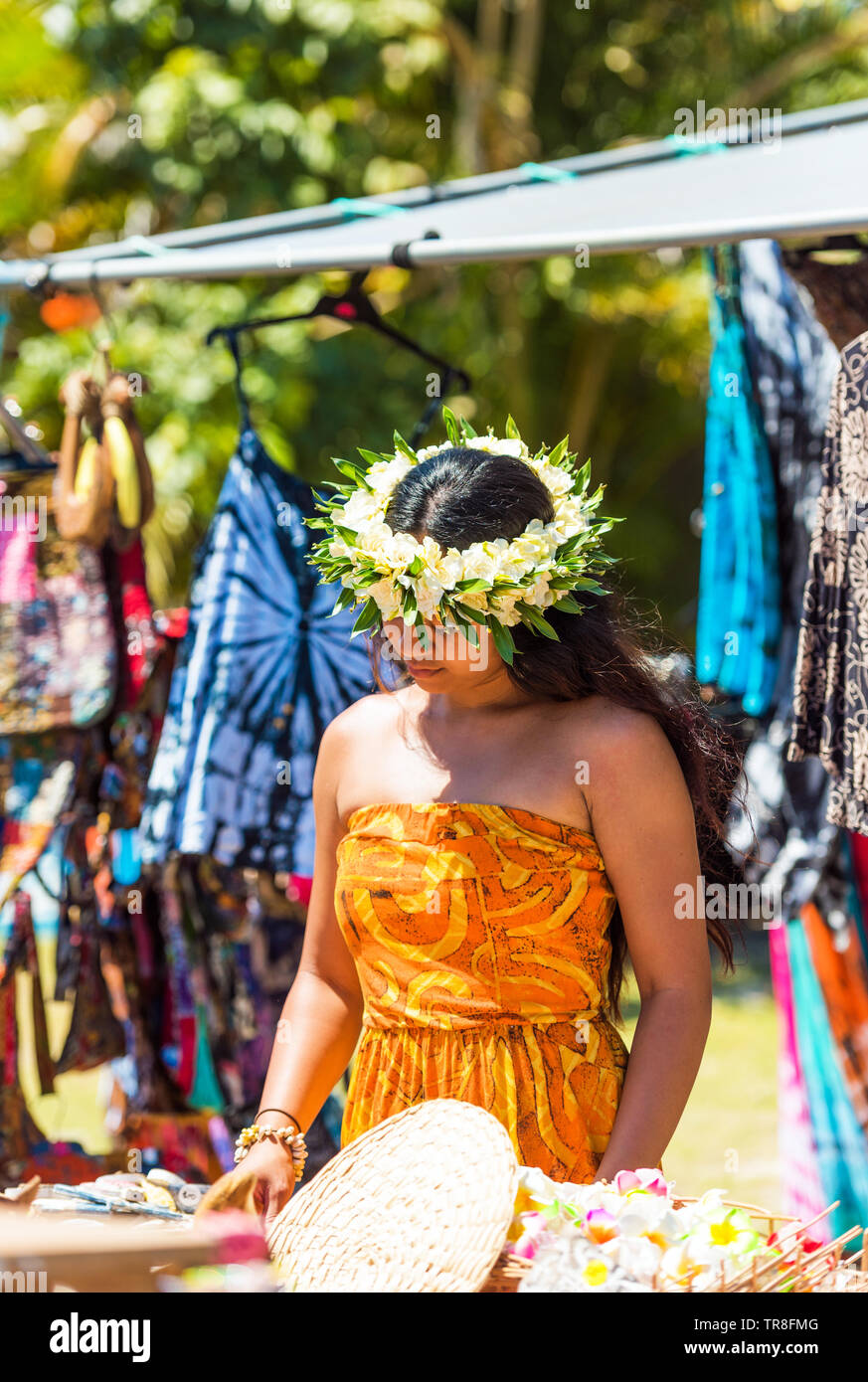 ARUTANGA, AITUTAKI, COOK ISLAND - SEPTEMBER 30, 2018: Girl with a white ...