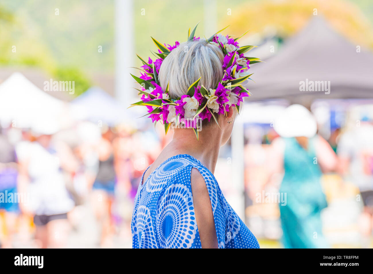 Woman with a wreath of flowers, Rarotonga, Aitutaki, Cook Islands. With ...