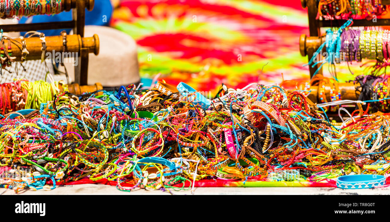 Multi-colored bracelets in the local market, Rarotonga, Aitutaki, Cook ...