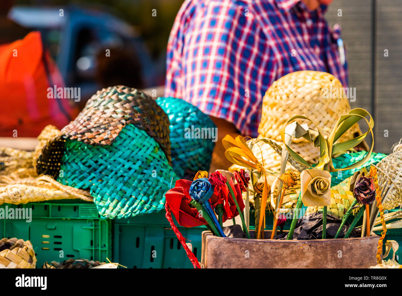 Wicker flowers and hats in the local market, Rarotonga, Aitutaki, Cook ...