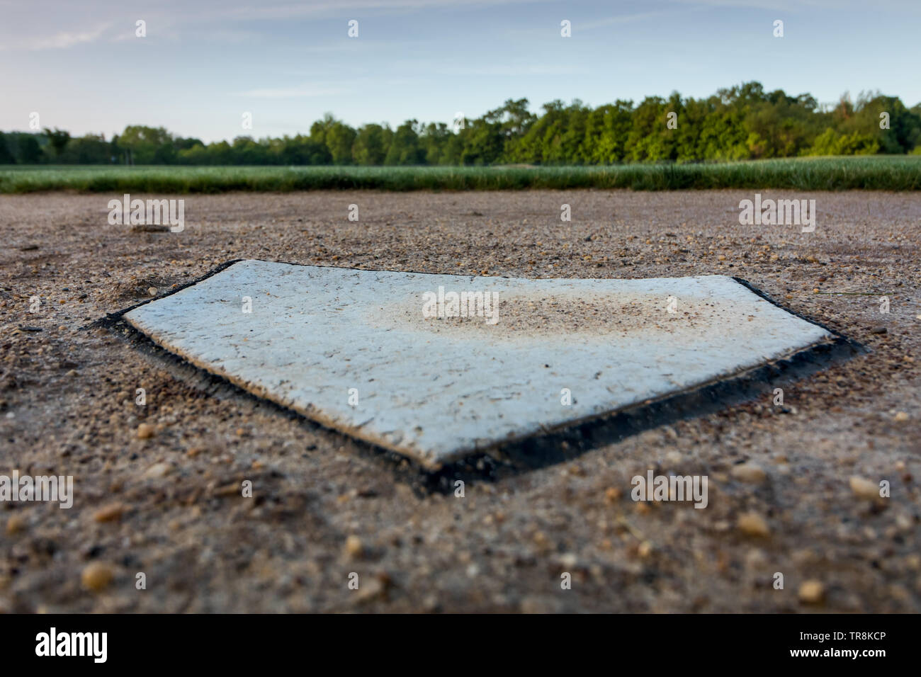 Second base closeup on field early morning Stock Photo - Alamy