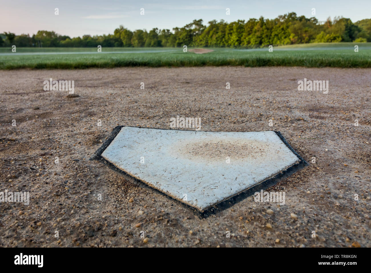 Second base closeup on field early morning Stock Photo - Alamy
