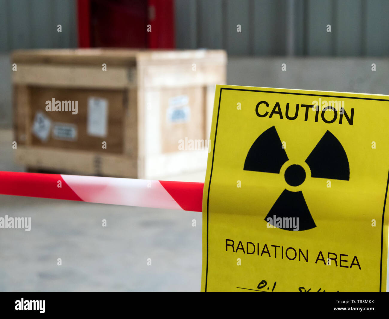 Radiation warning sign on the area warning tape around the Dangerous ...