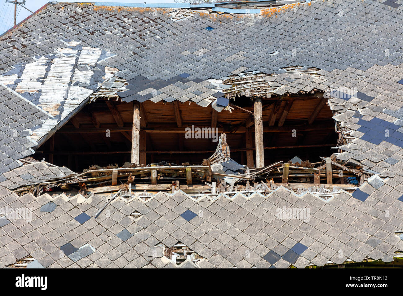 Roof damage hi-res stock photography and images - Alamy