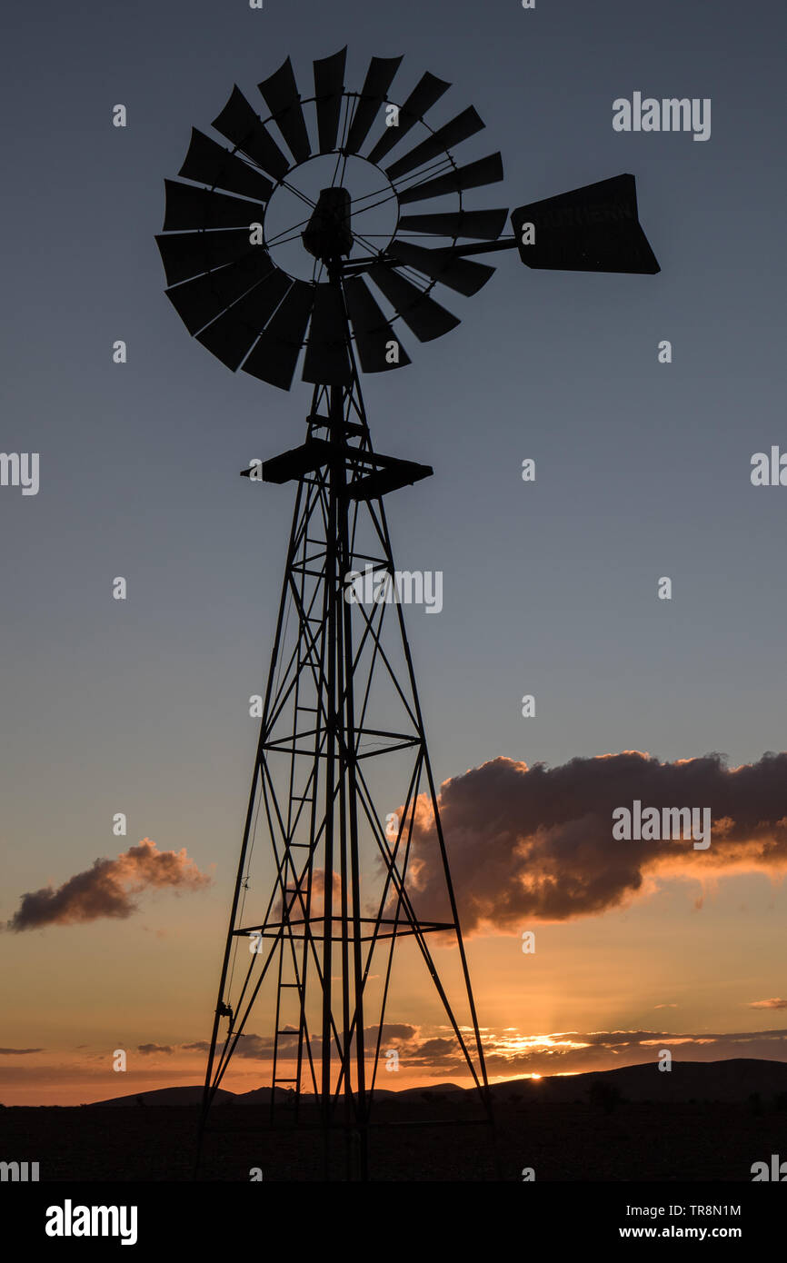 Sunset windmill australia outback hi-res stock photography and images ...