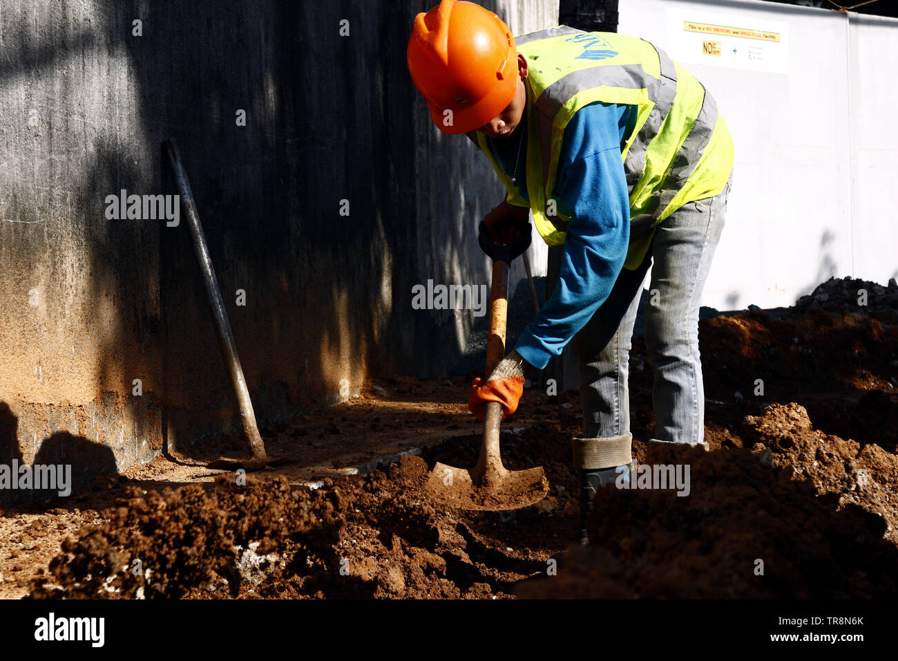 ANTIPOLO CITY, PHILIPPINES – MAY 30, 2019: A construction worker ...