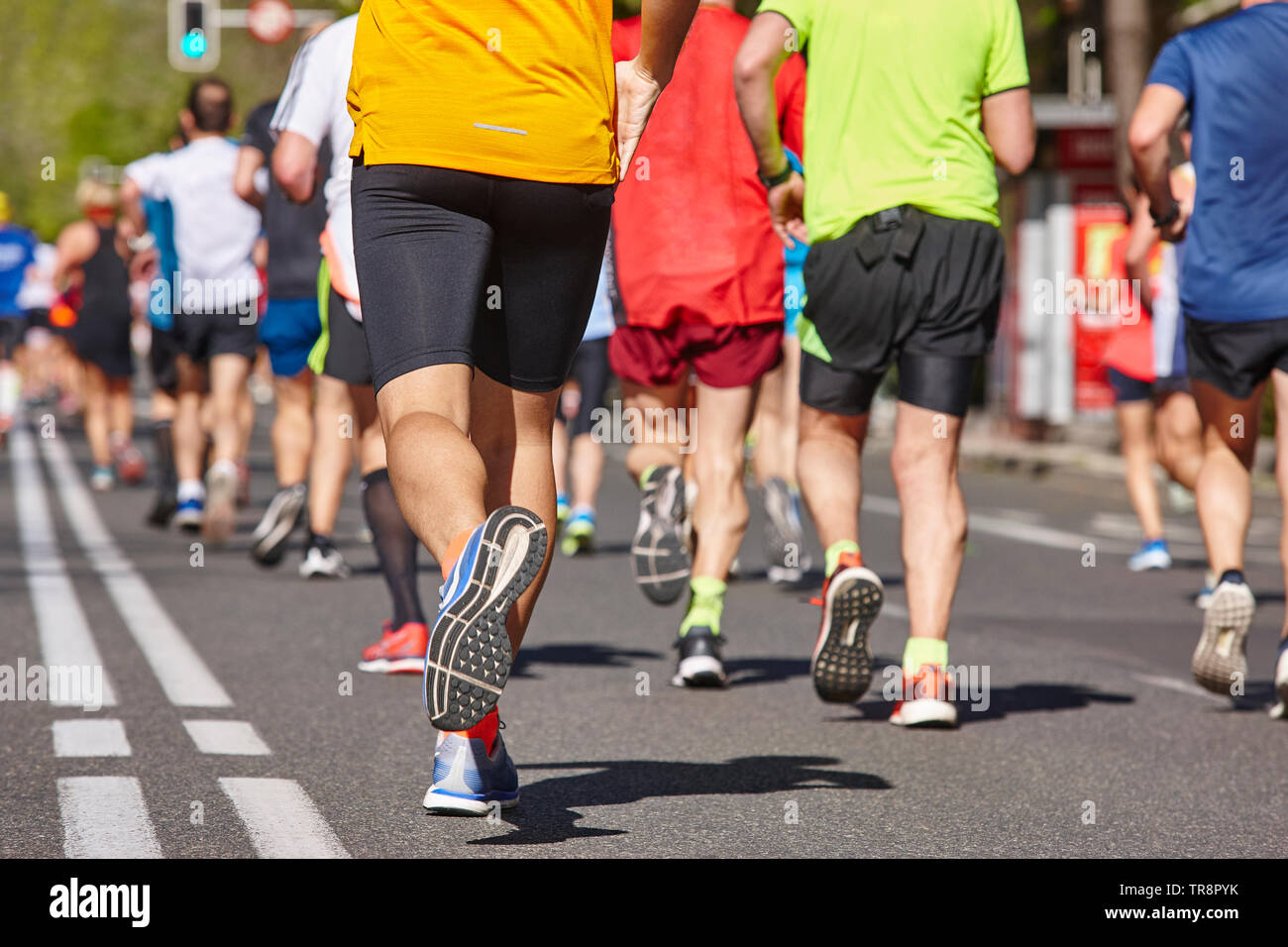 Marathon runners on the street. Healthy lifestyle. Athletes endurance ...