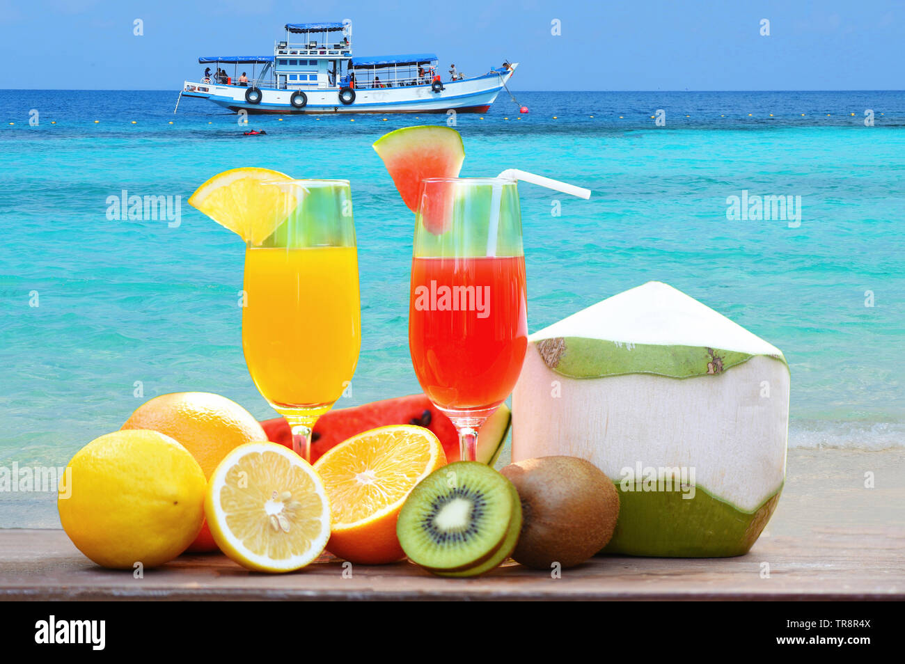 Set of tropical fruits colorful and fresh summer juice glass healthy ...