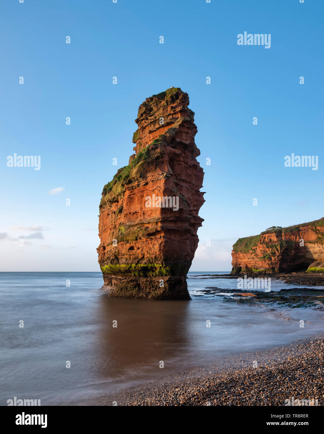 Beautiful sunrise landscape image of Ladram Bay beach in Devon England ...