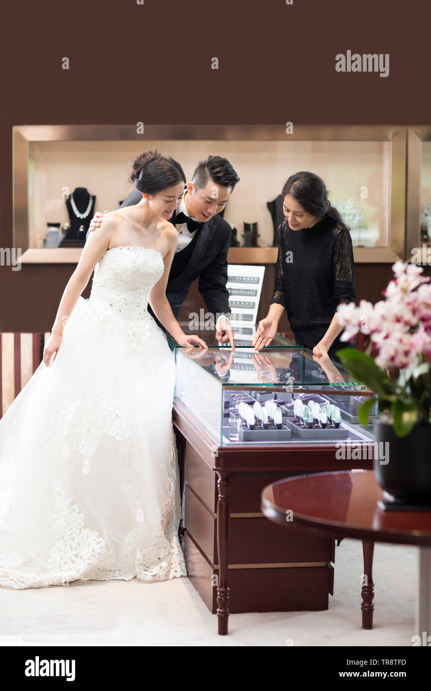 Bride and groom pointing hi-res stock photography and images - Alamy