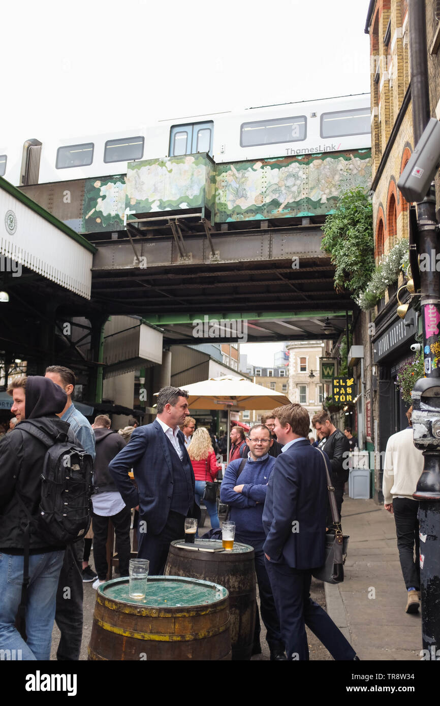 Views around Borough Market in London UK - People drinking outside the ...