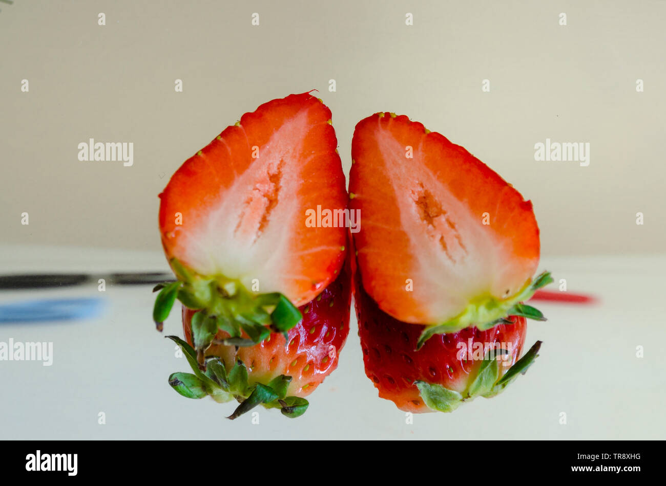 Fresh strawberry slice on a white background Stock Photo - Alamy
