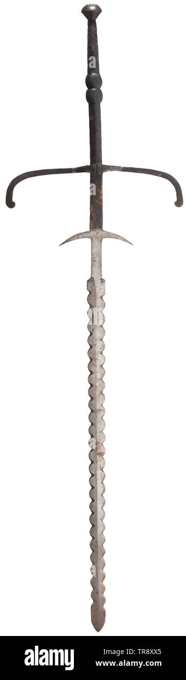 A South German two-handed flamberge, circa 1580 Sturdy blade with waved ...