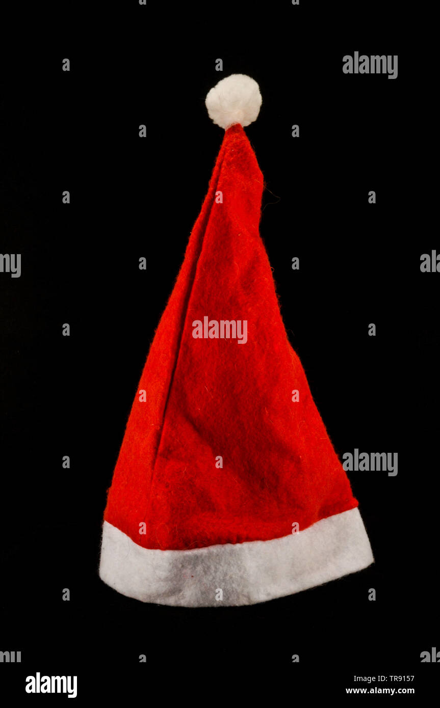 Santa Claus red hat isolated on white background Stock Photo - Alamy