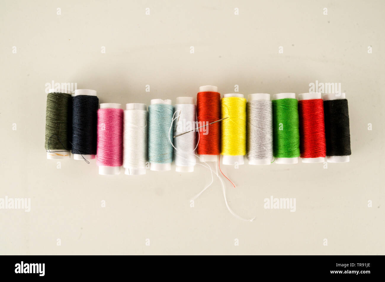 Photo Picture of Colored sewing thread wire background Stock Photo - Alamy