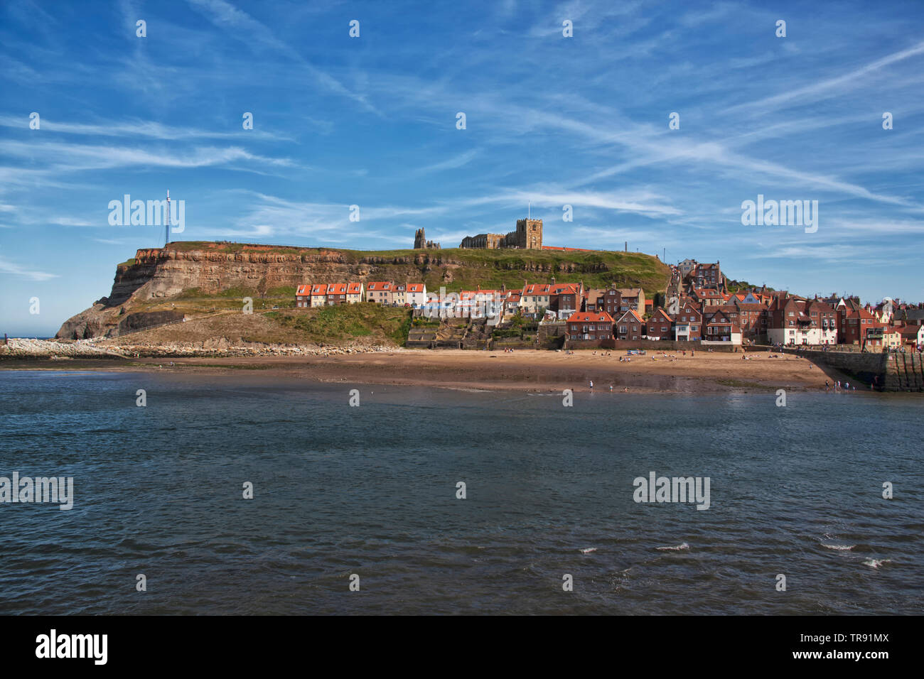 Looking across Whitby harbour towards the East cliff on top of this ...