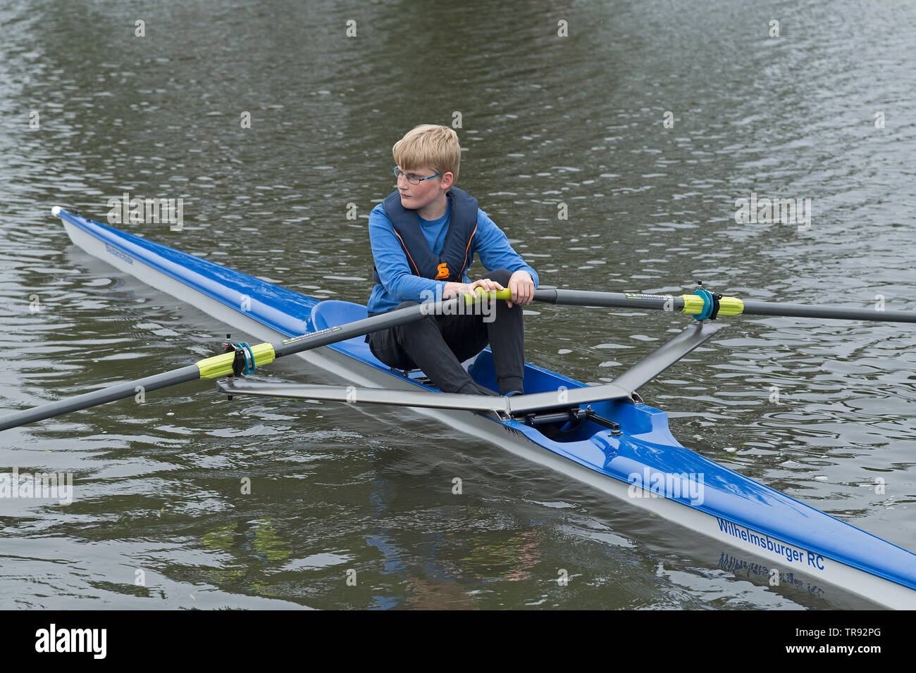 boy rowing single scull, rowing club Wilhelmsburg, Hamburg, Germany ...