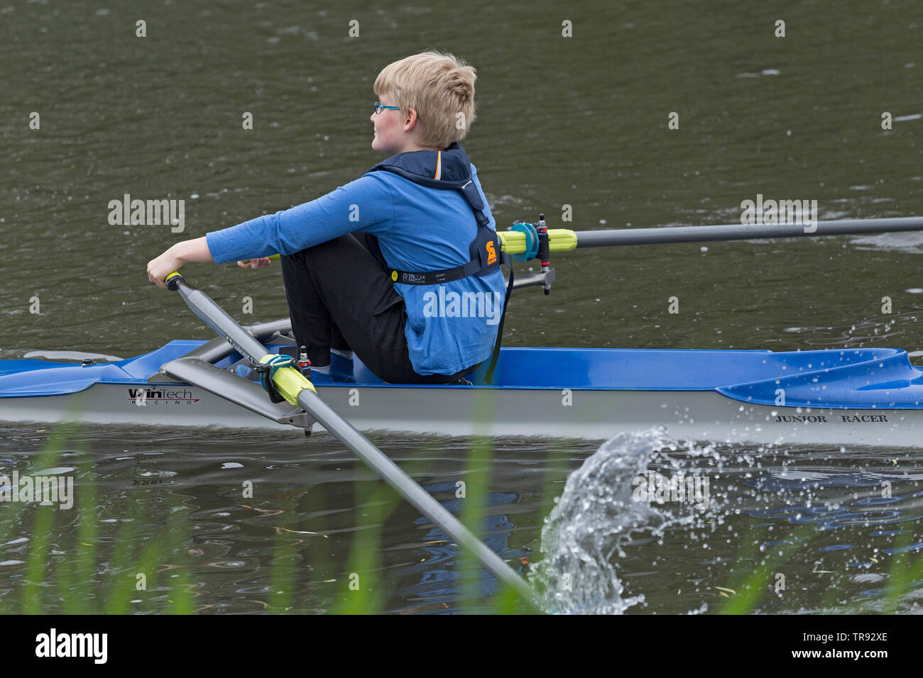 Boy rowing boat hi-res stock photography and images - Alamy