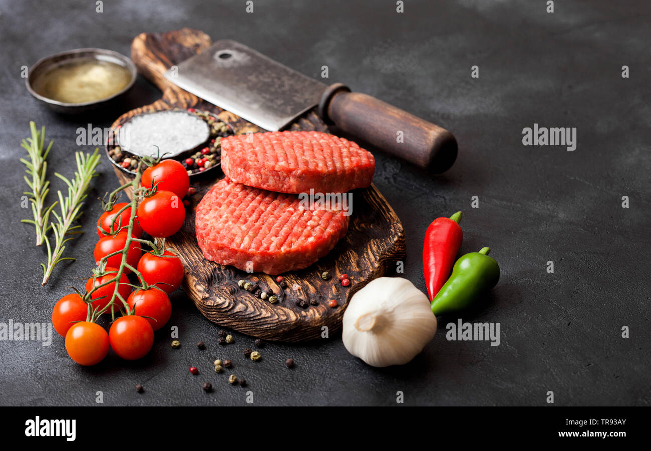 Fresh raw minced homemade farmers grill beef burgers on vintage ...