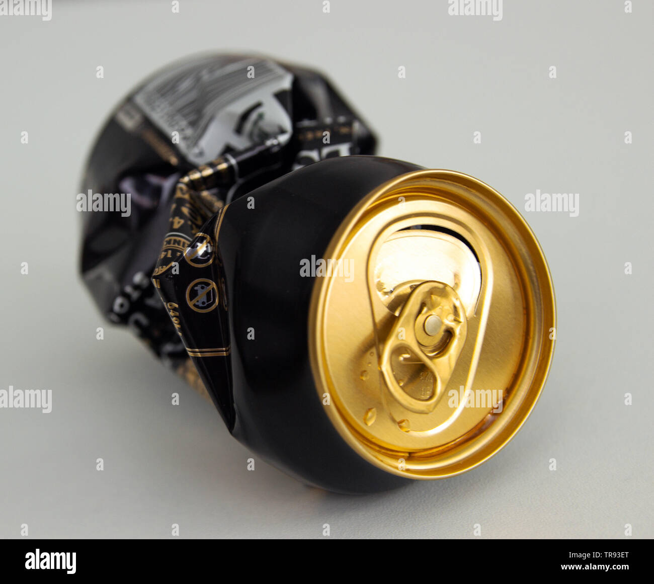 Compressed can isolated on a white background, Aluminum recycling old ...