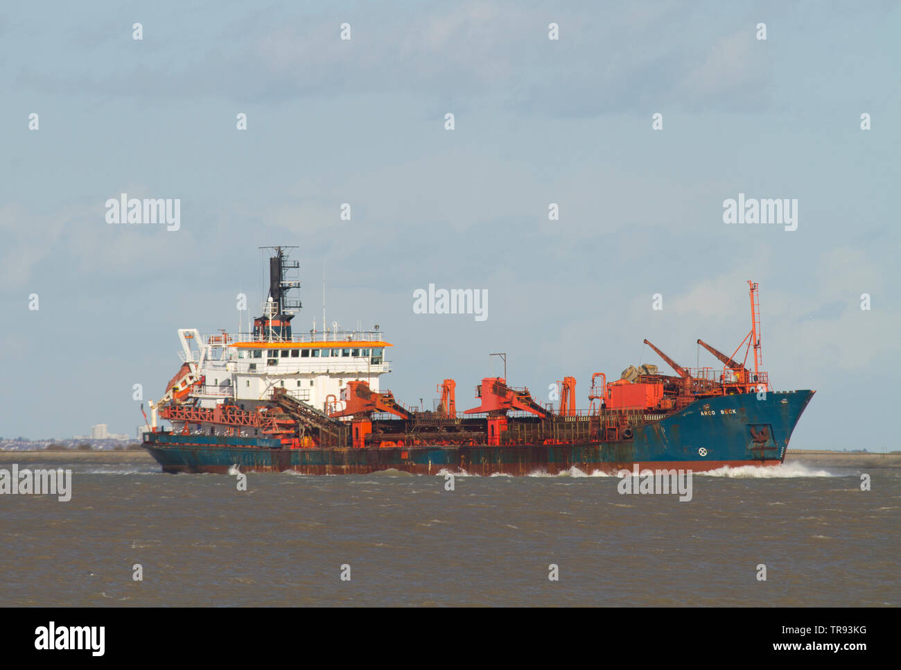 The Arco Beck hopper dredger ship sailing in the Thames Estuary near ...