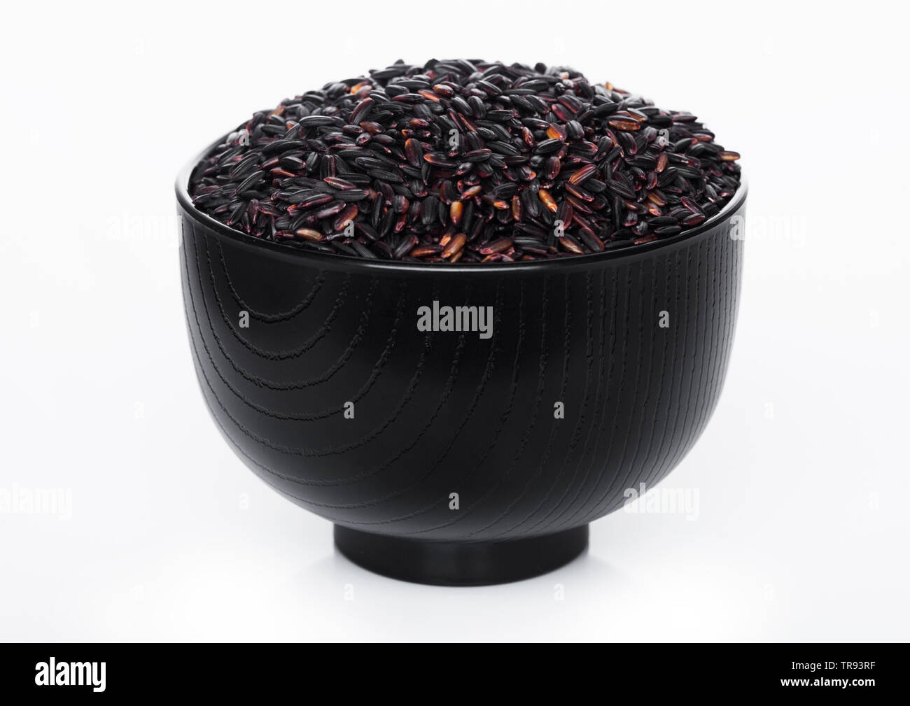 Black bowl of raw organic black venus rice on white background Stock ...